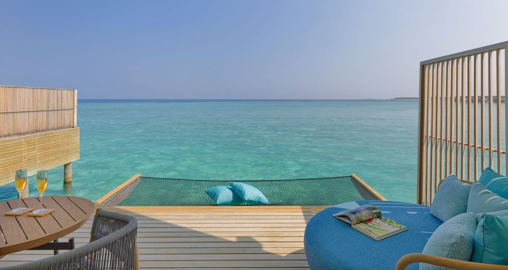Luxurious overwater bungalows in the Maldives, surrounded by crystal ...